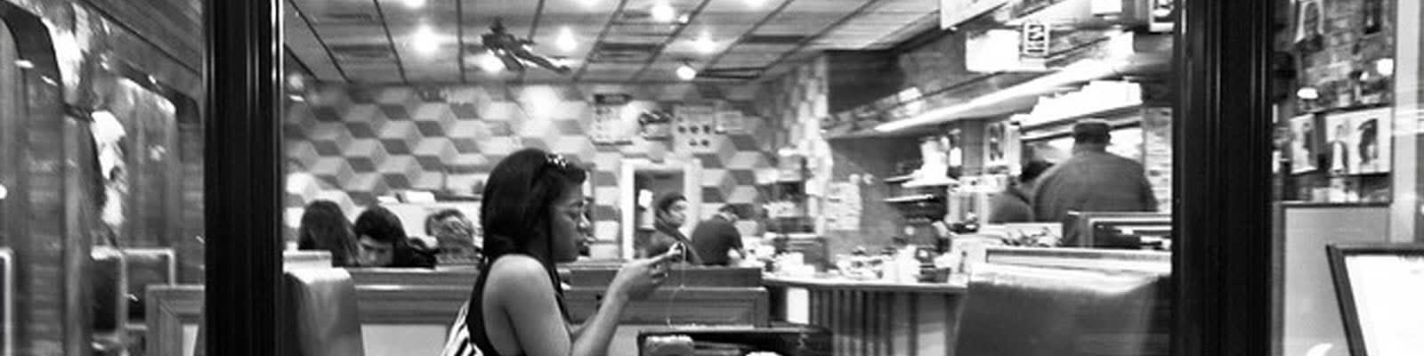How Restaurants Welcome Solo Diners with Booth Dining Tables